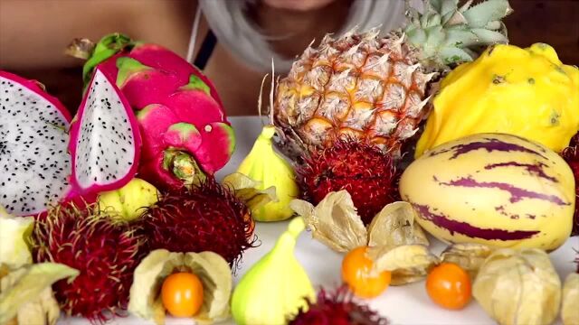 Eating dragon fruit, pineapple, rambutan, lanterns fruit, fruit grand ...