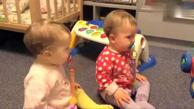 The twins have a pacifier, but the sister has to snatch the sister’s ...