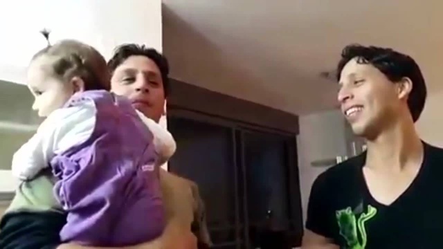 Suddenly there are two dads, the little baby hugs this is the father ...