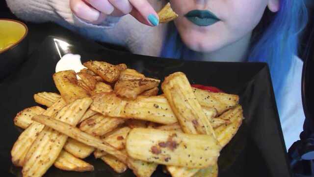 The beautiful sister eats peppery potato chips, adds a bowl of olives ...