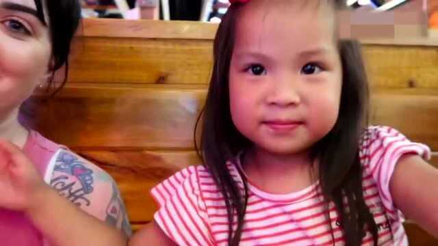 After a family eats, drinks, and plays, Meimei sleeps in the car and ...
